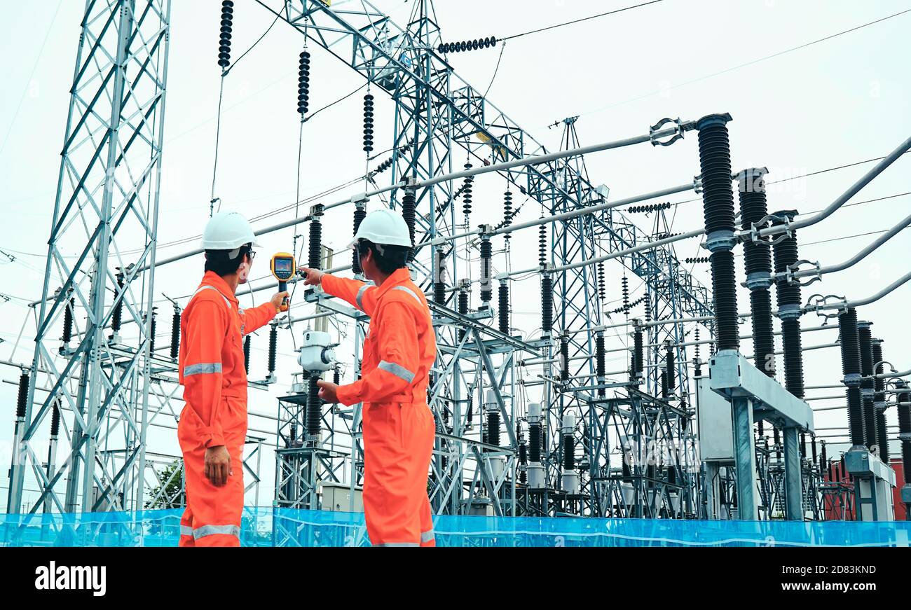 Electrical engineers used a thermometer to check for faults in ...