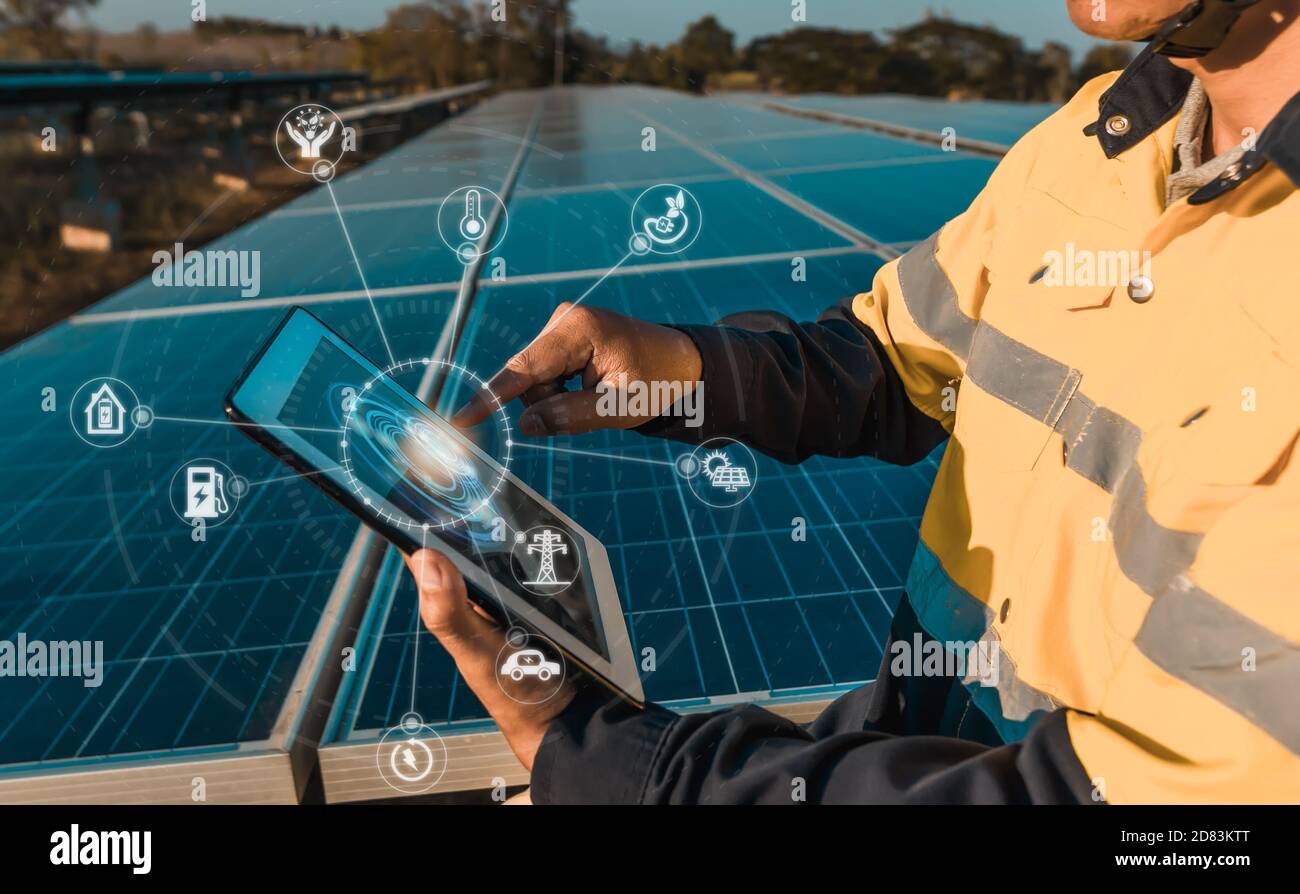 The solar farm(solar panel) with engineers is checking the operation of ...