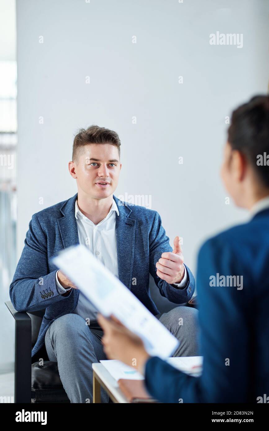 Coworker answering hi-res stock photography and images - Alamy