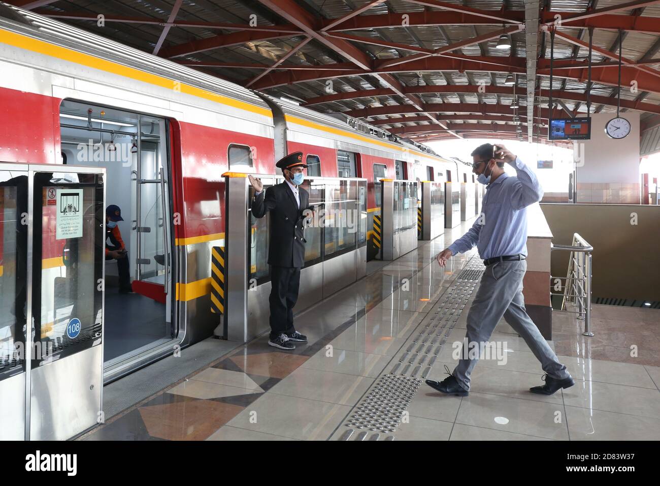 Beijing, Pakistan. 26th Oct, 2020. A passenger takes the Orange Line at ...