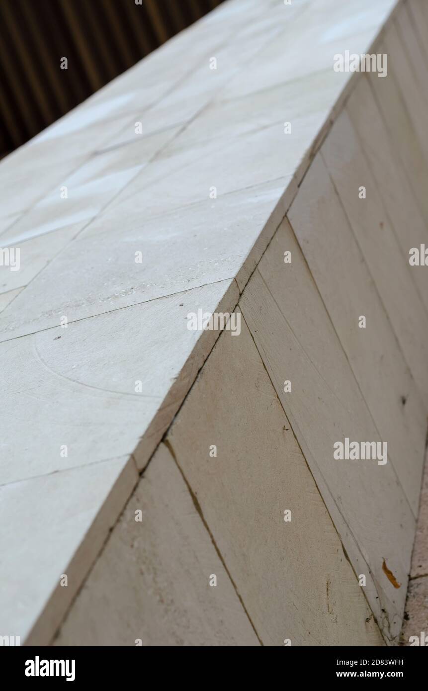 Abstract architectural composition. High building facade faced with ...