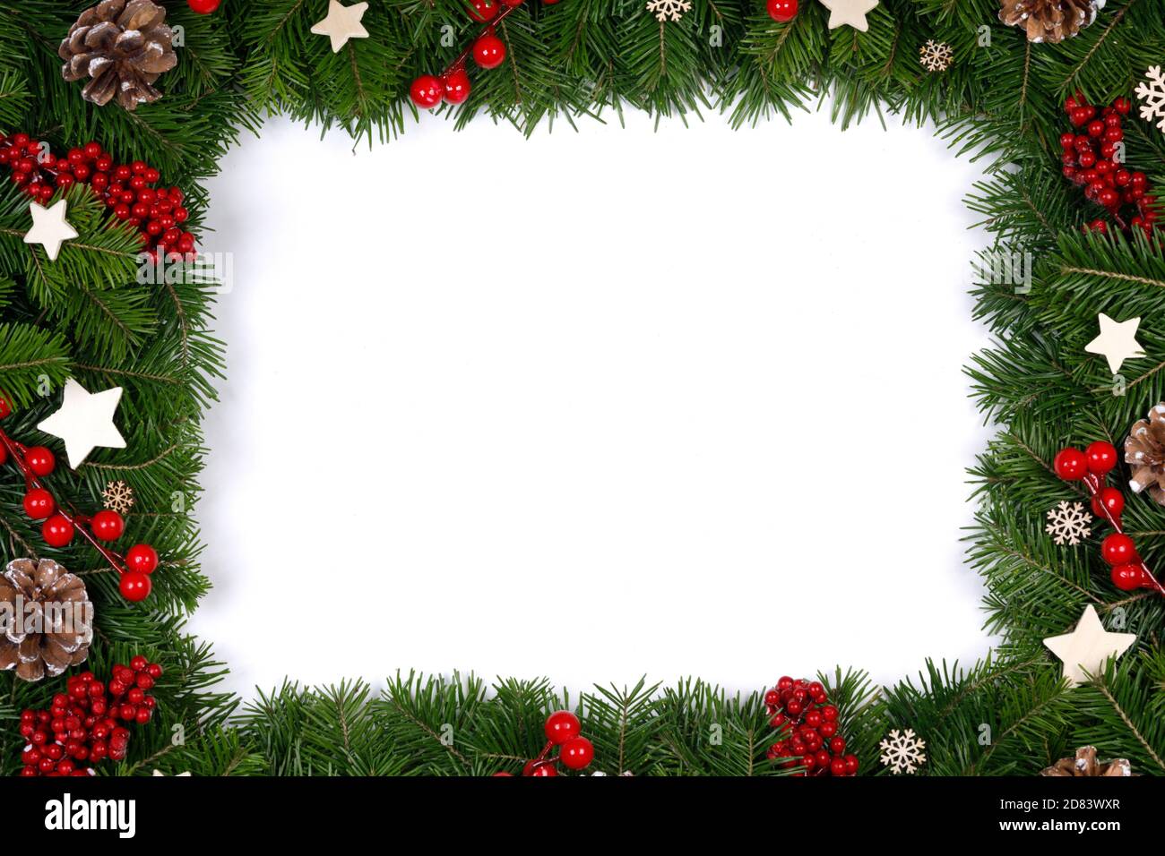 Christmas Border frame of tree branches on white background with copy ...