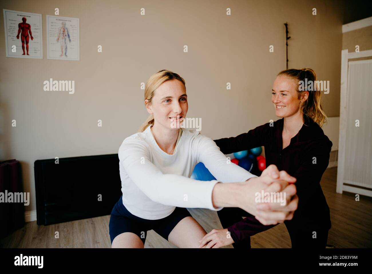 Woman squatting position hi-res stock photography and images - Alamy