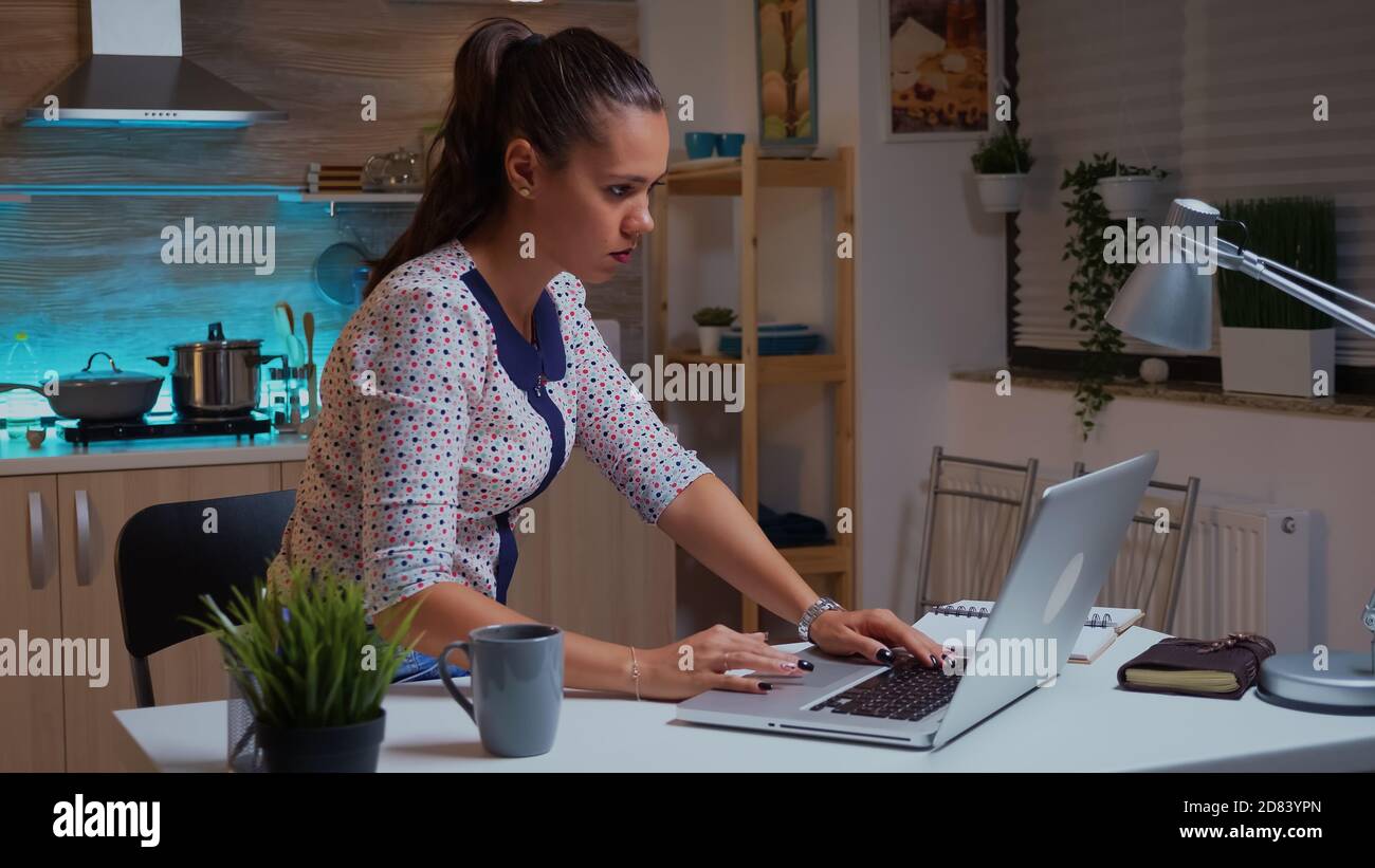 Freelancer closing laptop leaving kitchen hi-res stock photography and ...