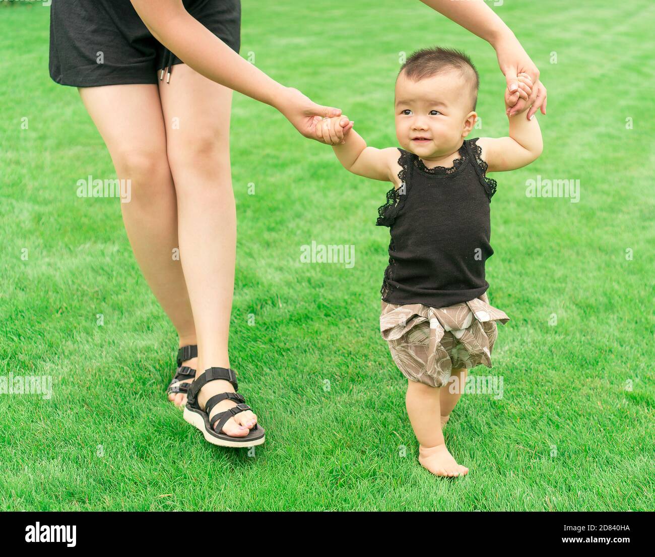 baby learning walking Stock Photo - Alamy