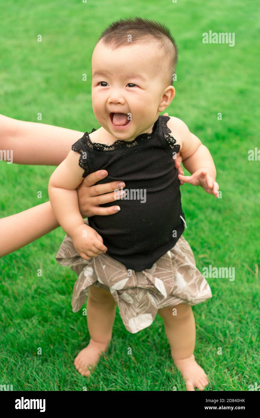 baby learning walking Stock Photo - Alamy