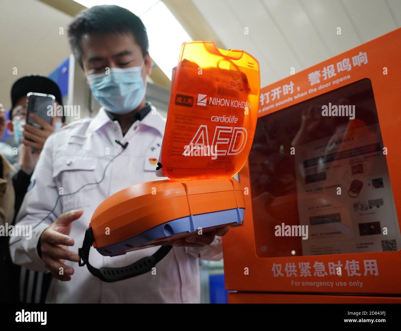 Beijing, China. 27th Oct, 2020. A staff member of Beijing Emergency ...