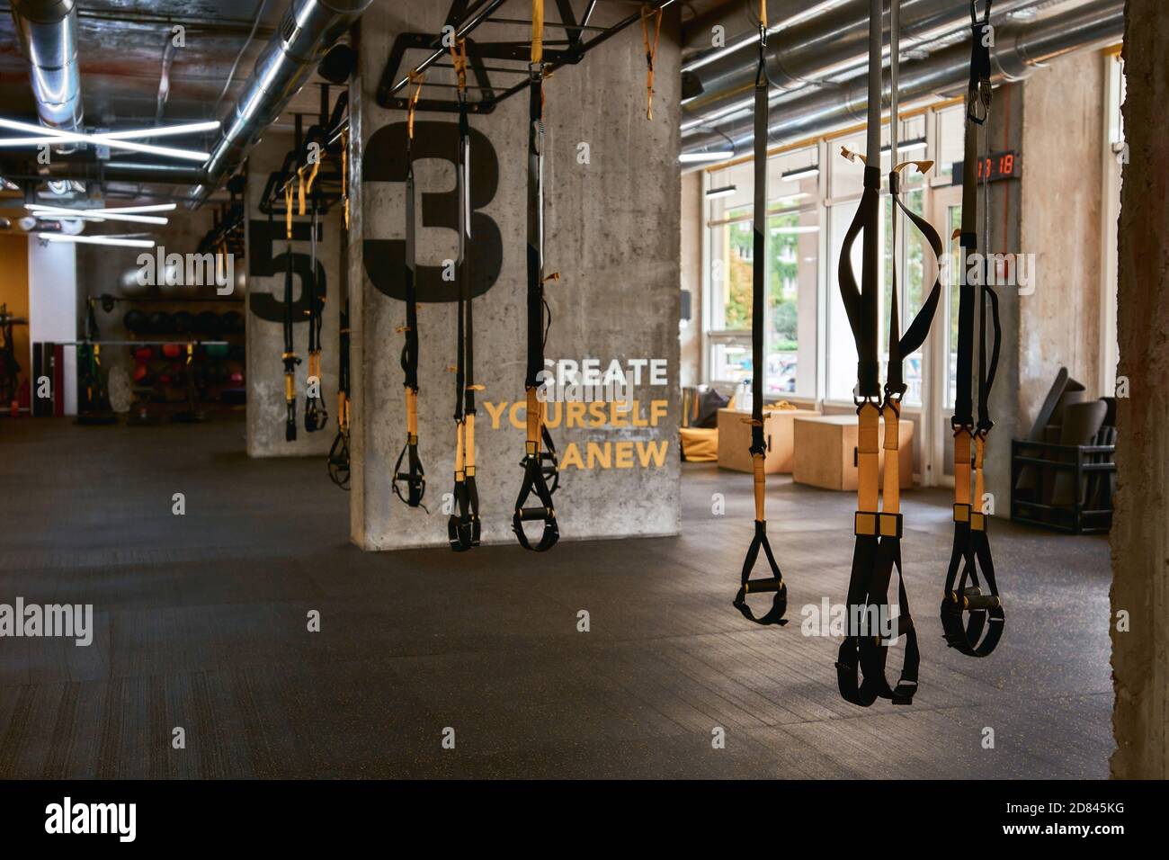 Fitness equipment. Trx straps inside of a gym, functional training and ...