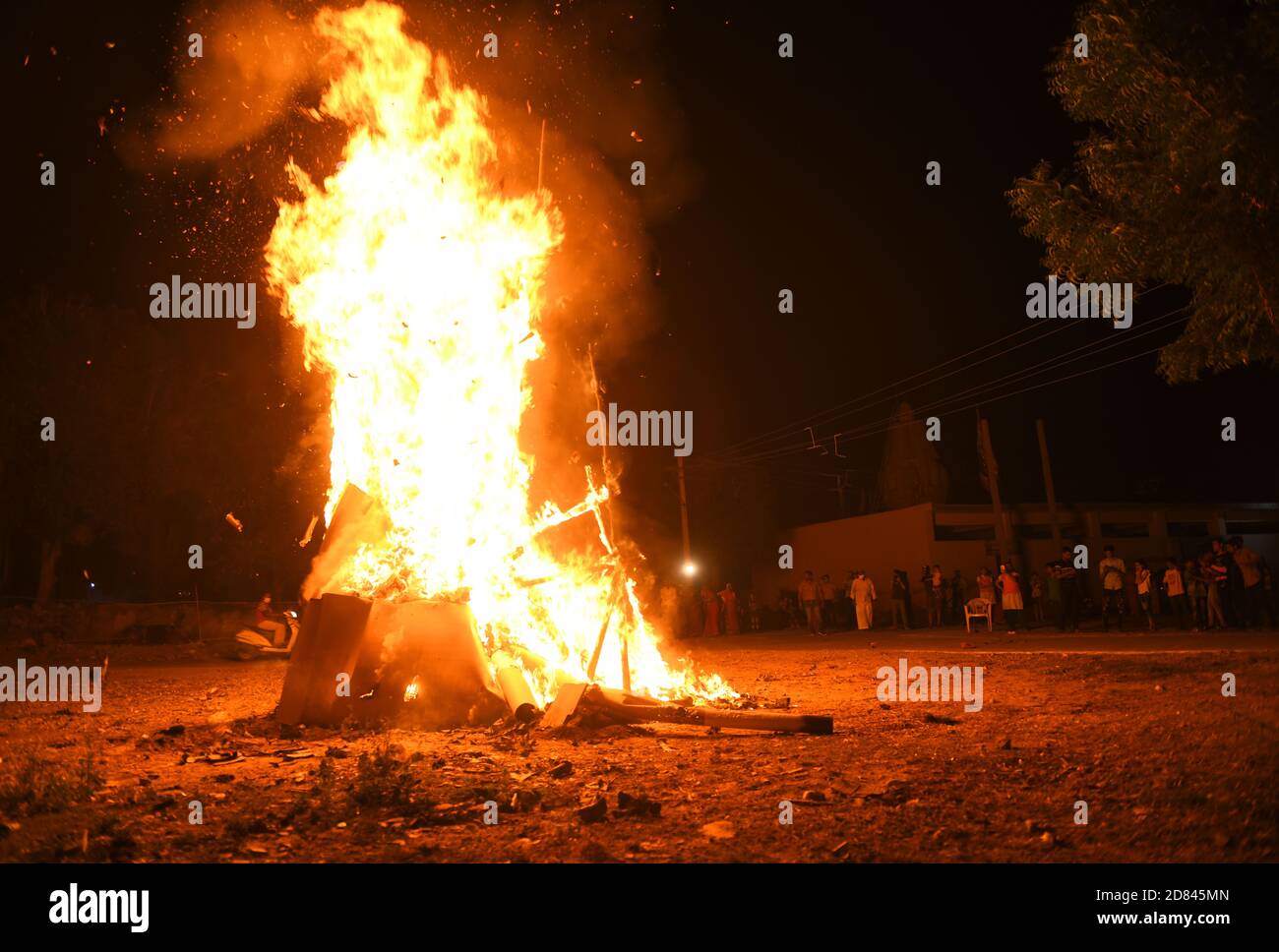 Beawar, Rajasthan, India, Oct 25,2020: People look on as an effigy of ...