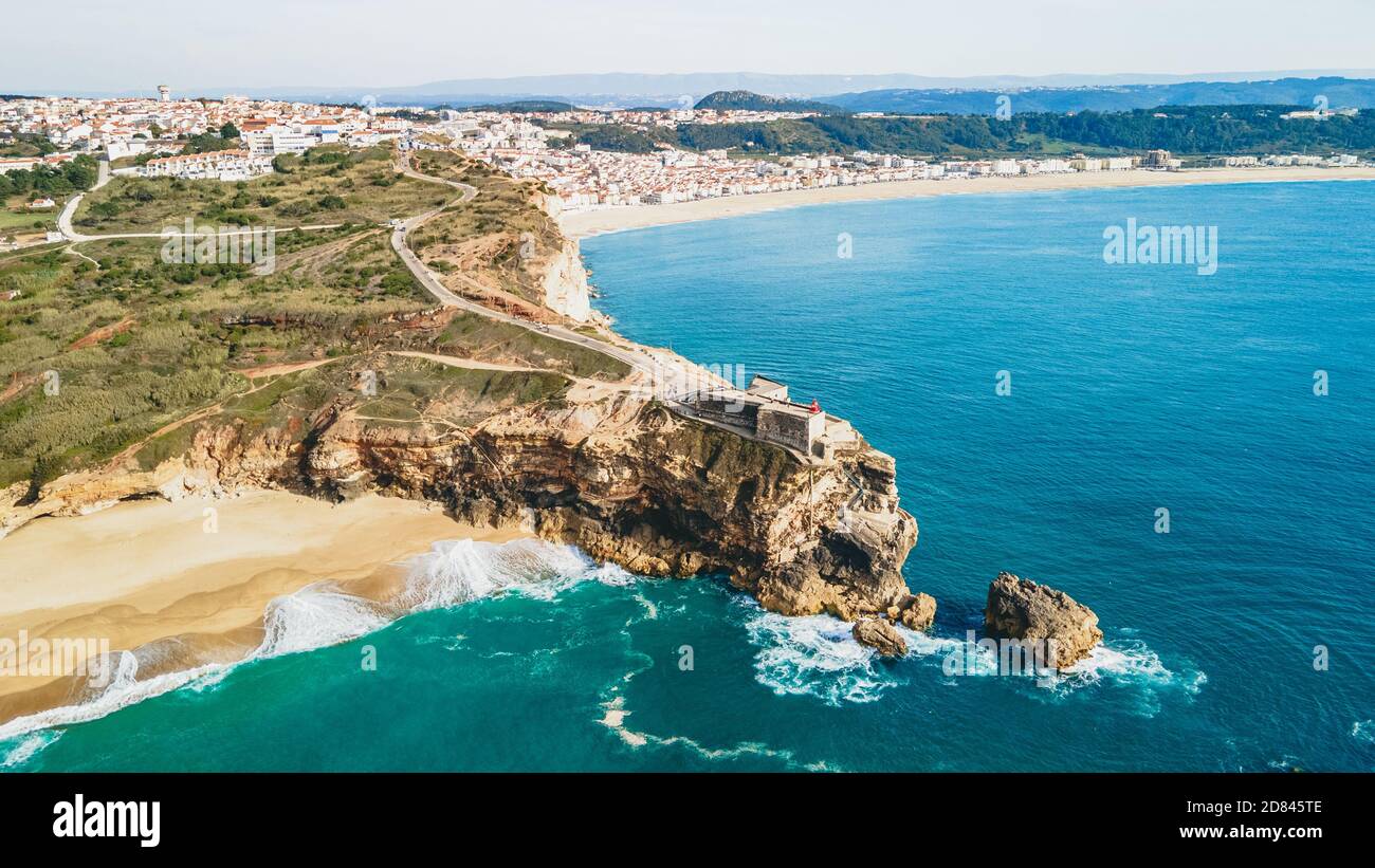 Nazare light house with beach from the ocean Stock Photo - Alamy