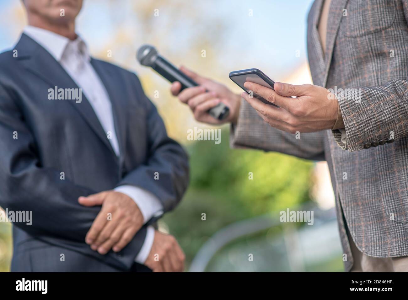 Filming with smartphone outdoors hi-res stock photography and images ...