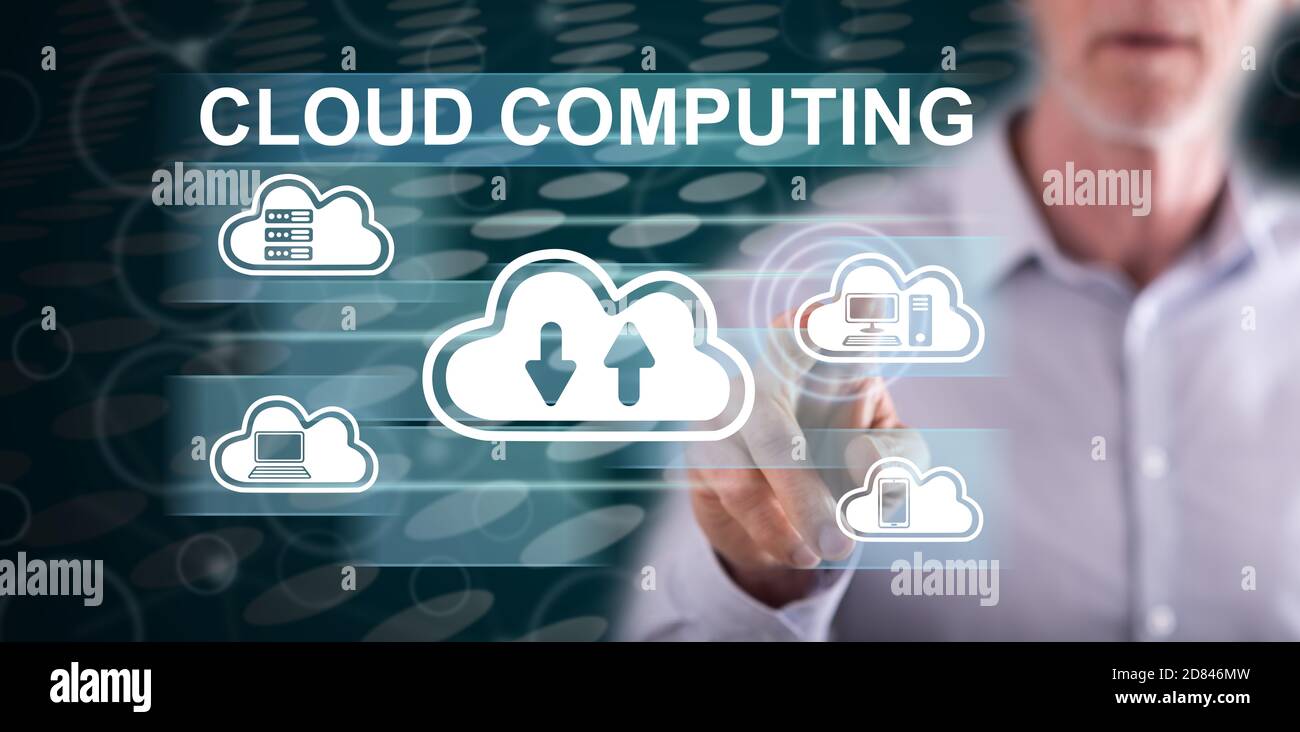 Man touching a cloud computing concept on a touch screen with his ...