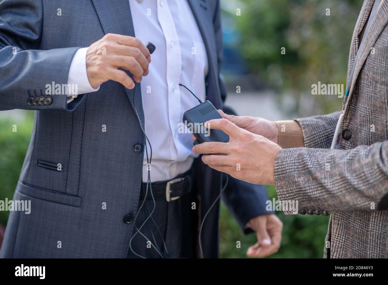 Holding mic with both hands hi-res stock photography and images - Alamy