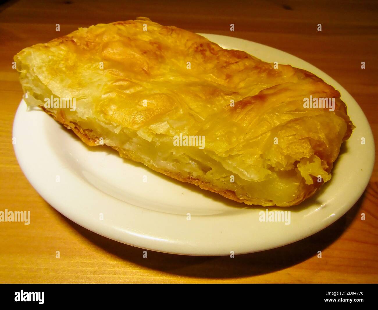 Greek Cuisine. Bougatsa (Custard Pie with Phyllo and Honey Stock Photo ...