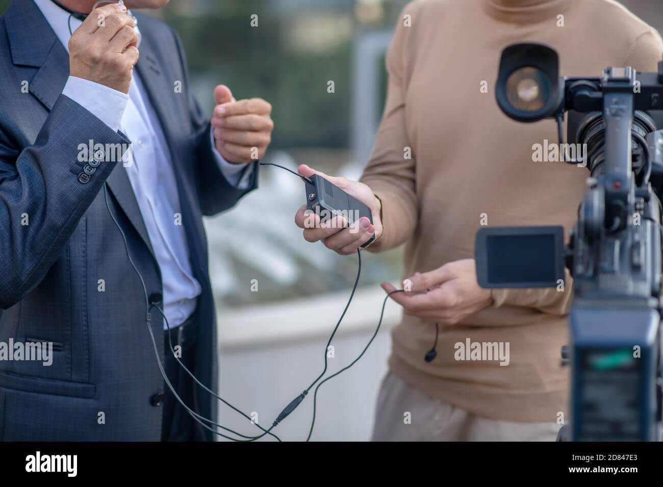 Cameraman with camera in hands hi-res stock photography and images - Alamy