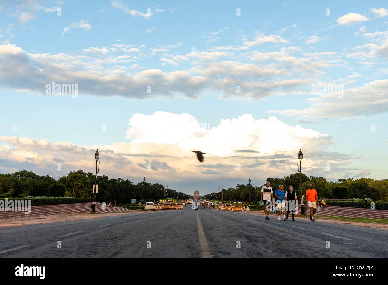 View of a beautiful sky and sunset against the backdrop of India Gate ...