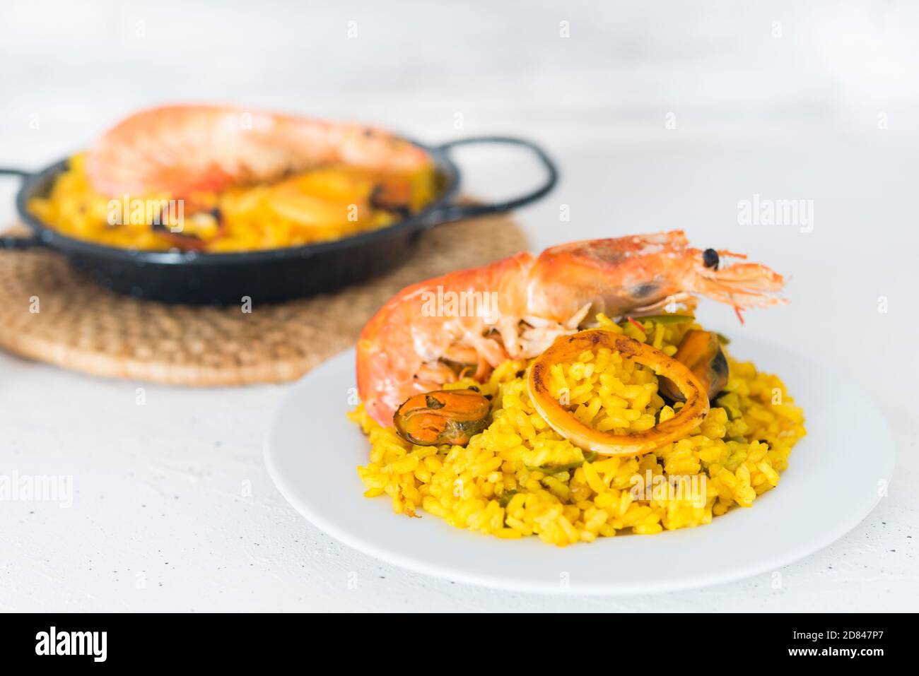 Paella typical spanish food in granite background Stock Photo - Alamy