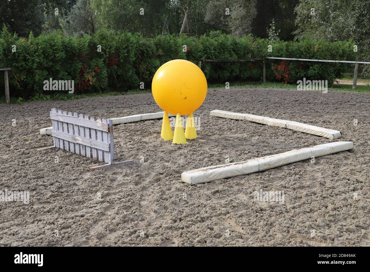 Image of an empty training field. Barriers for schooling horses as a ...