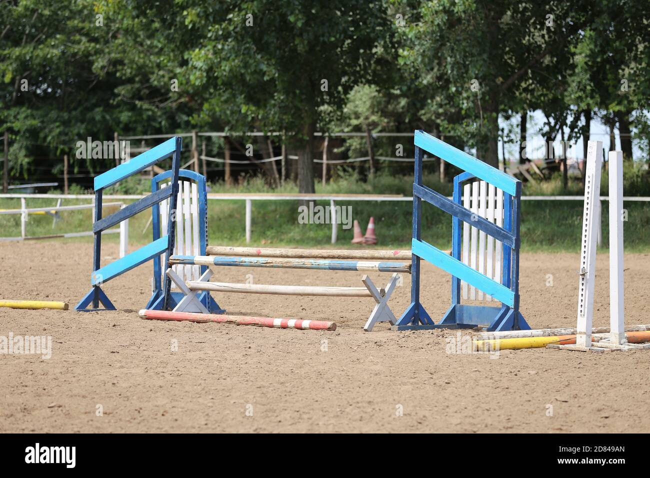 Image of an empty training field. Barriers for schooling horses as a ...
