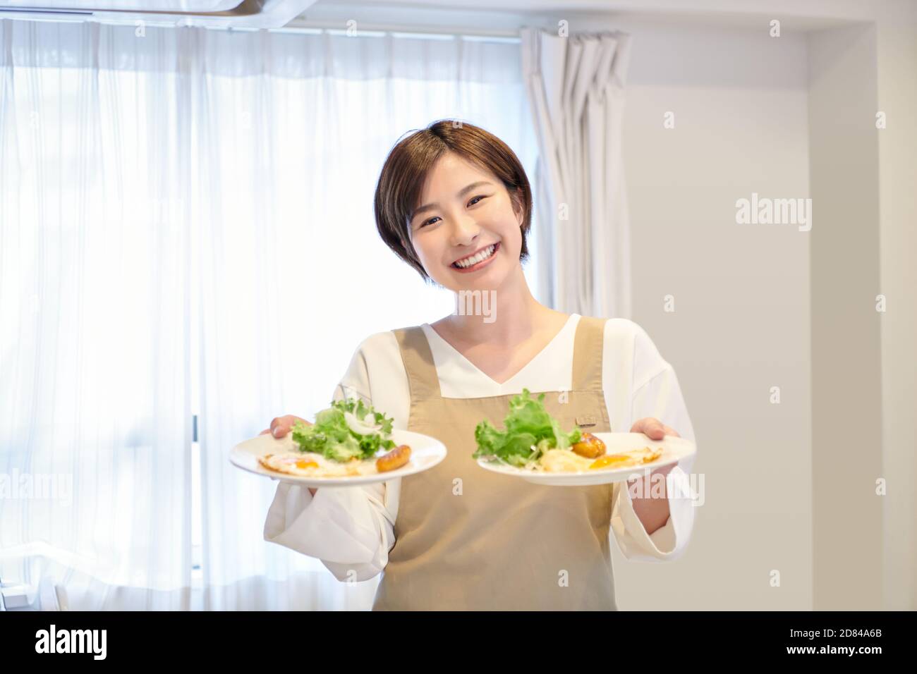 Japanese woman at home Stock Photo - Alamy