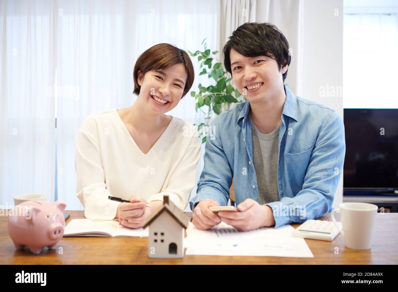 Japanese couple at home Stock Photo - Alamy