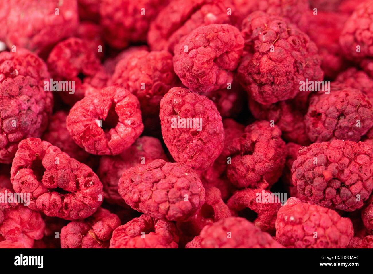 Pink freeze dried raspberries hi-res stock photography and images - Alamy