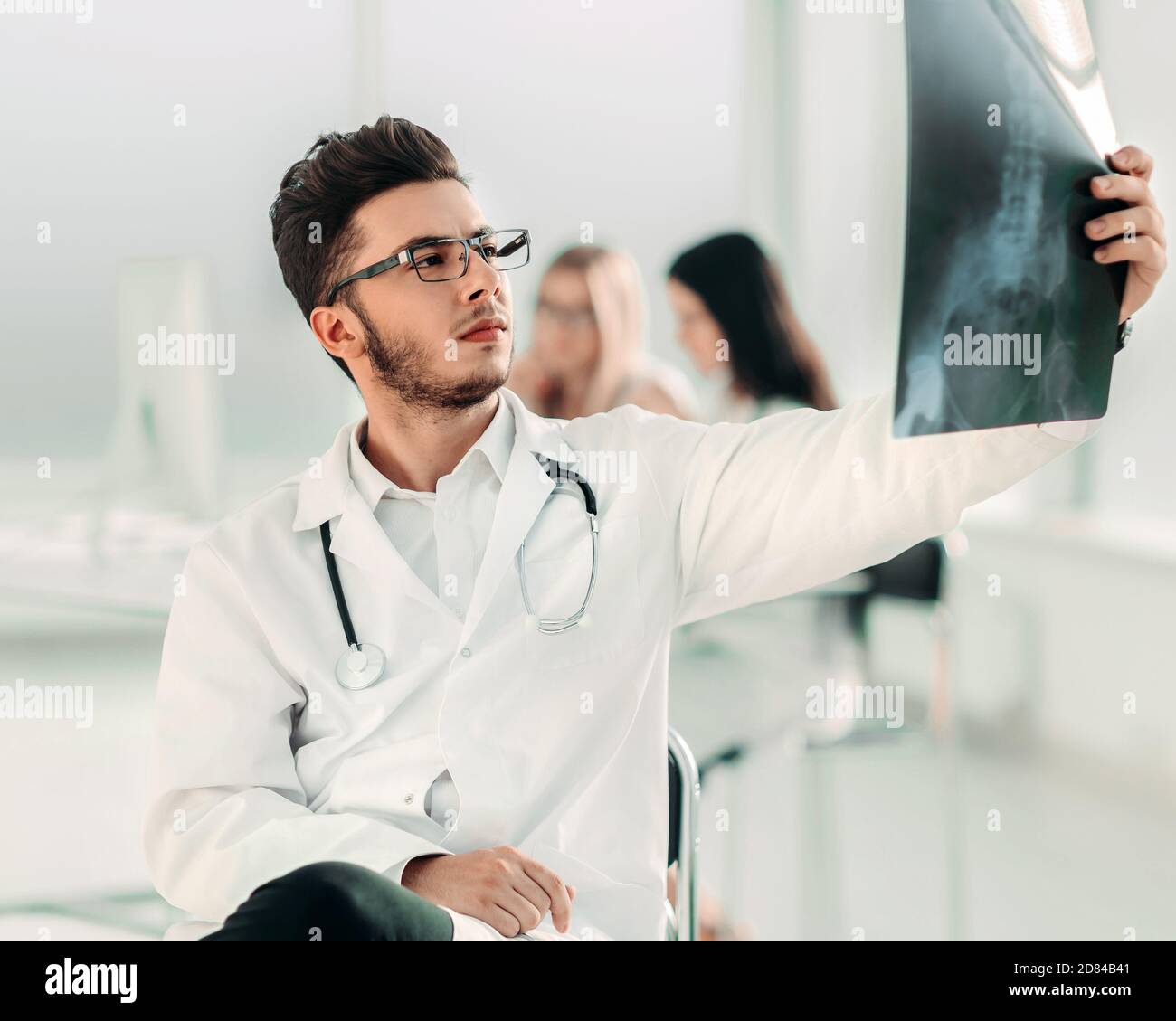 Happy radiologist holding x ray hi-res stock photography and images - Alamy