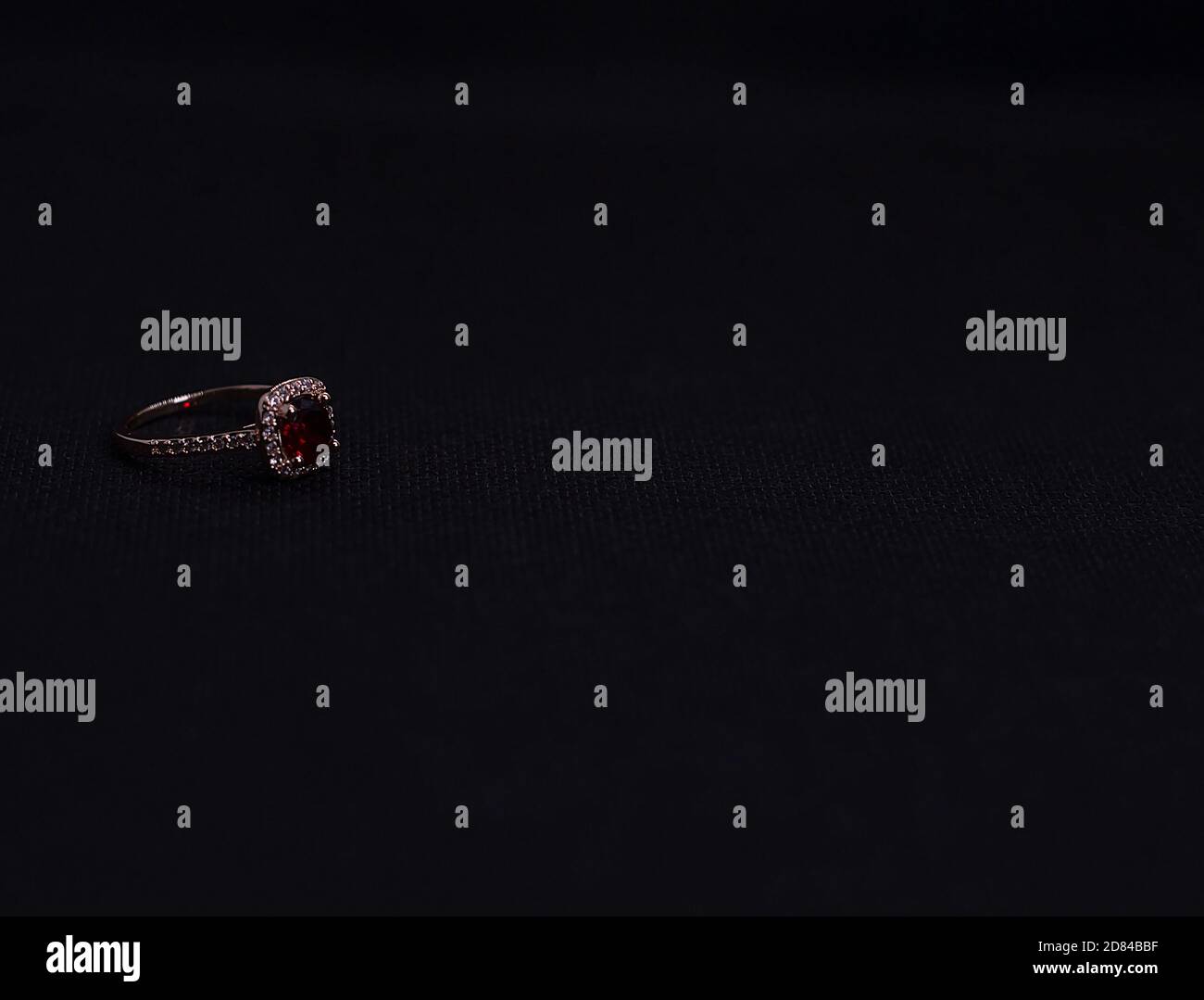 ruby ring on black background Stock Photo - Alamy