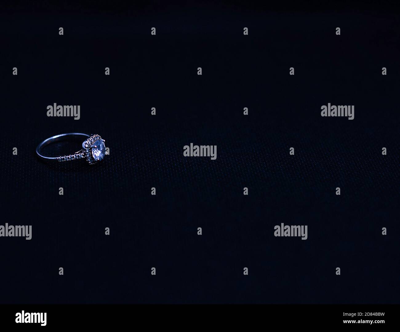 diamond ring on black background Stock Photo - Alamy