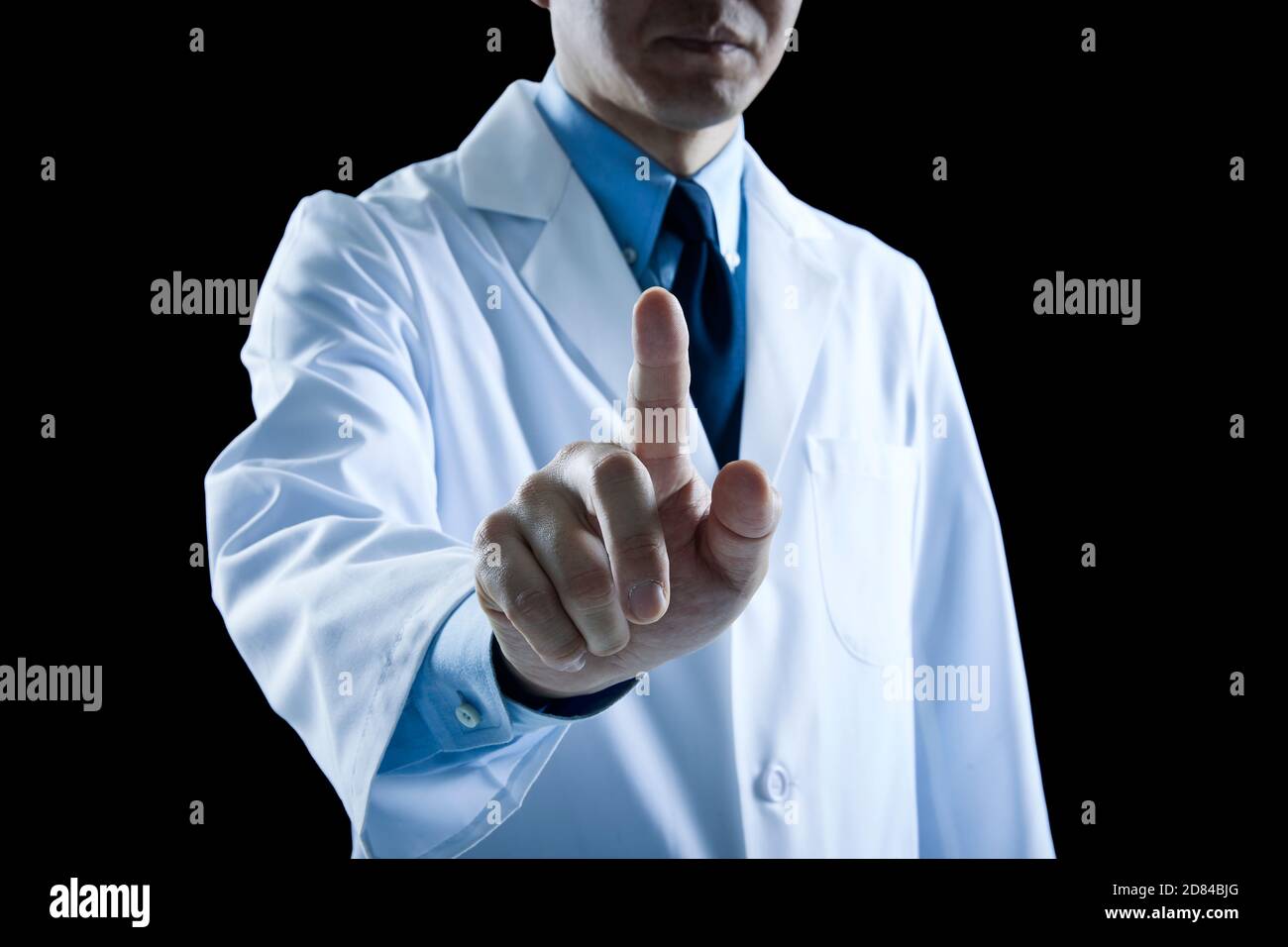 Doctor on black background Stock Photo - Alamy