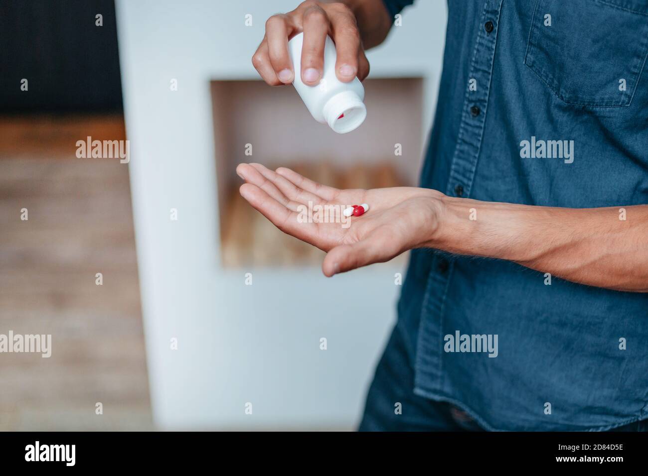 Man taking a pill hi-res stock photography and images - Alamy