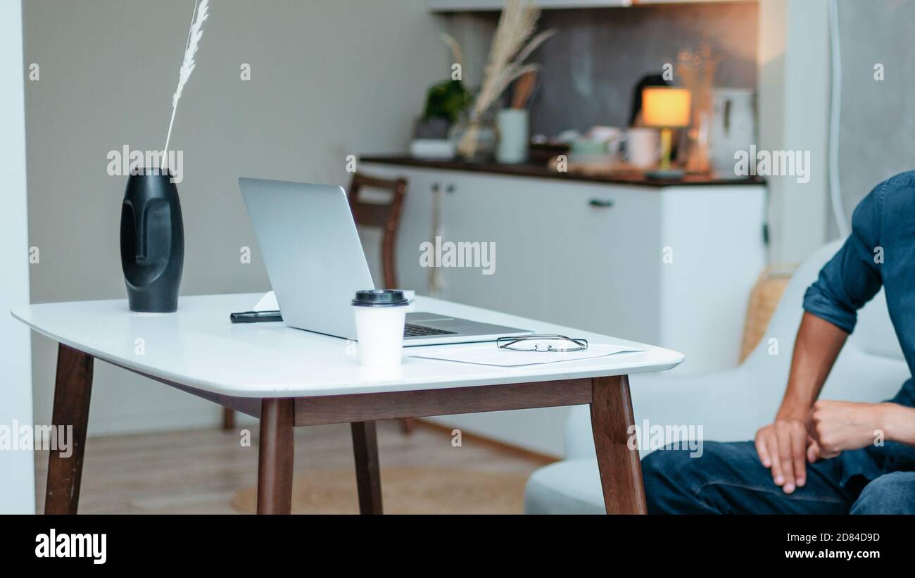 creative young man sitting in a home office Stock Photo - Alamy