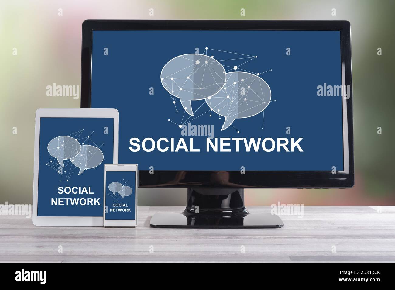 Social network concept shown on different information technology ...