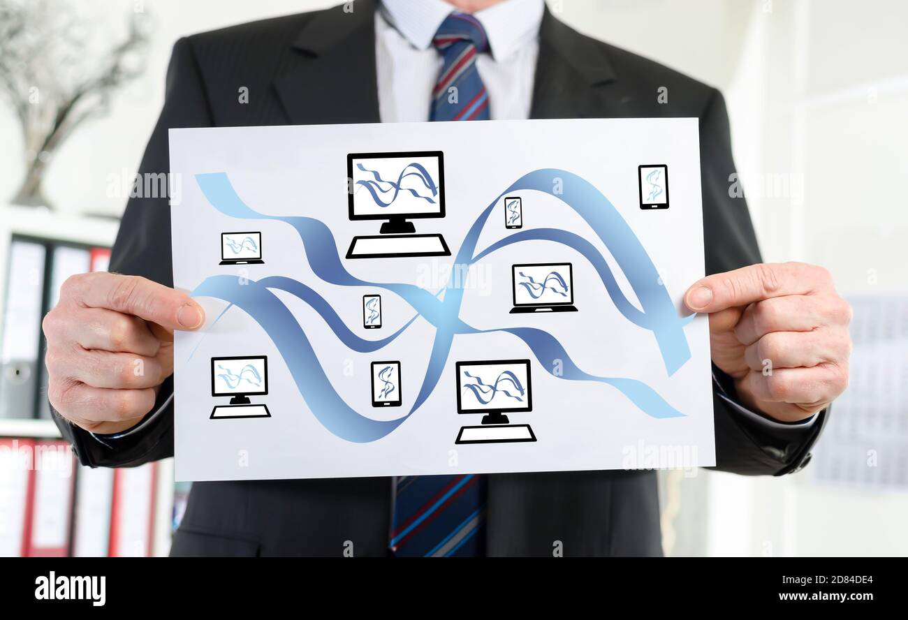 Paper showing network communication concept held by a businessman Stock ...