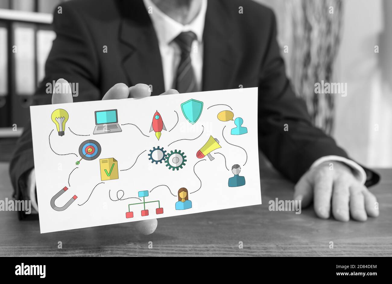 Businessman showing an index card with business strategy concept Stock ...