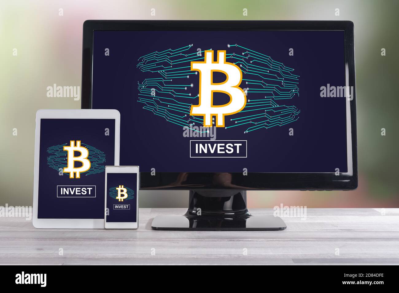 Bitcoin concept shown on different information technology devices Stock ...