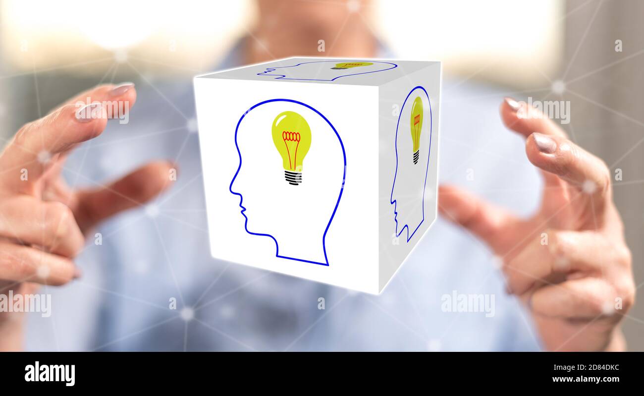 Human brain ideas concept between hands of a woman in background Stock ...