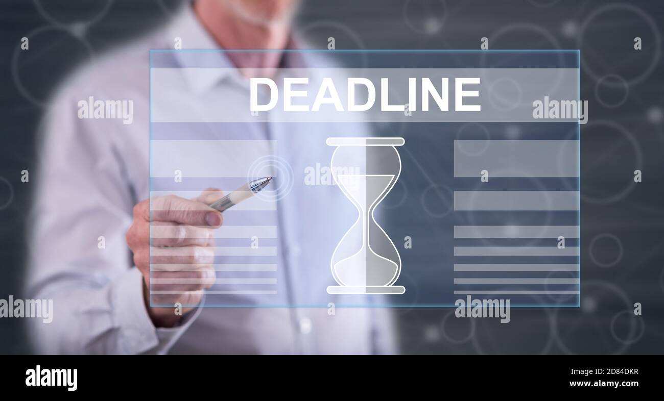 Man touching a deadline concept on a touch screen with a pen Stock ...