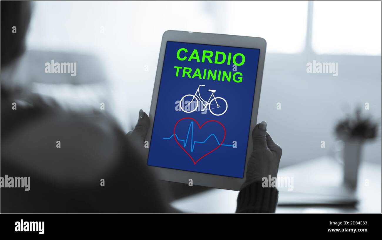 Tablet screen displaying a cardio training concept Stock Photo - Alamy
