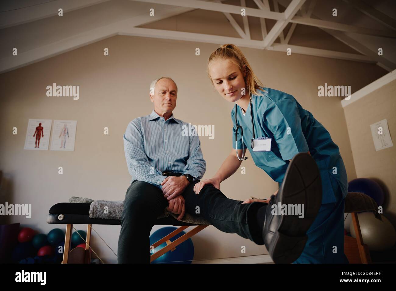 Senior patient doing recovery exercise hi-res stock photography and ...