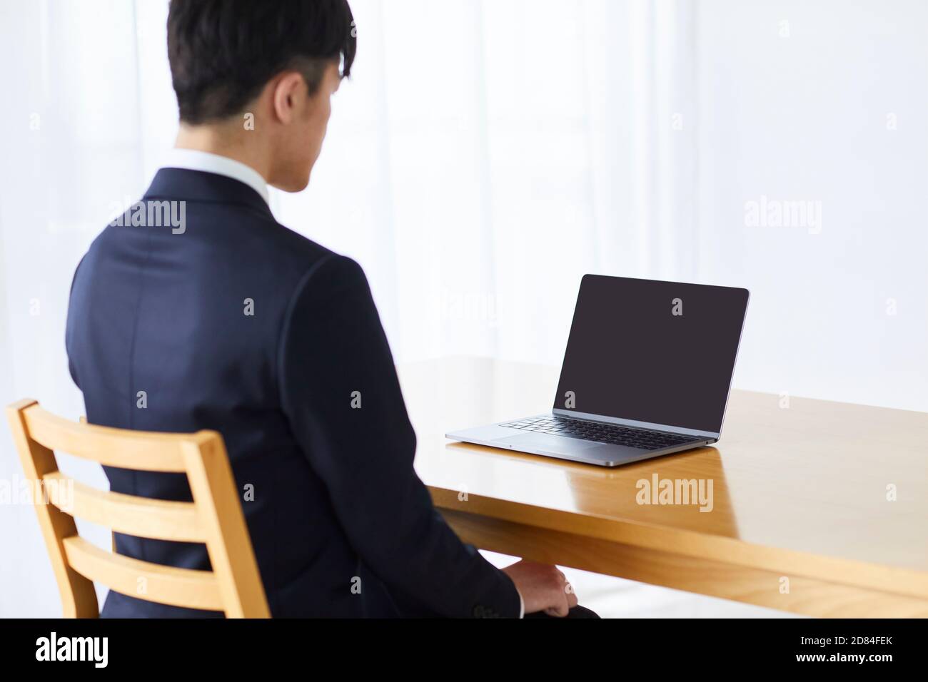 Japanese man working from home Stock Photo - Alamy