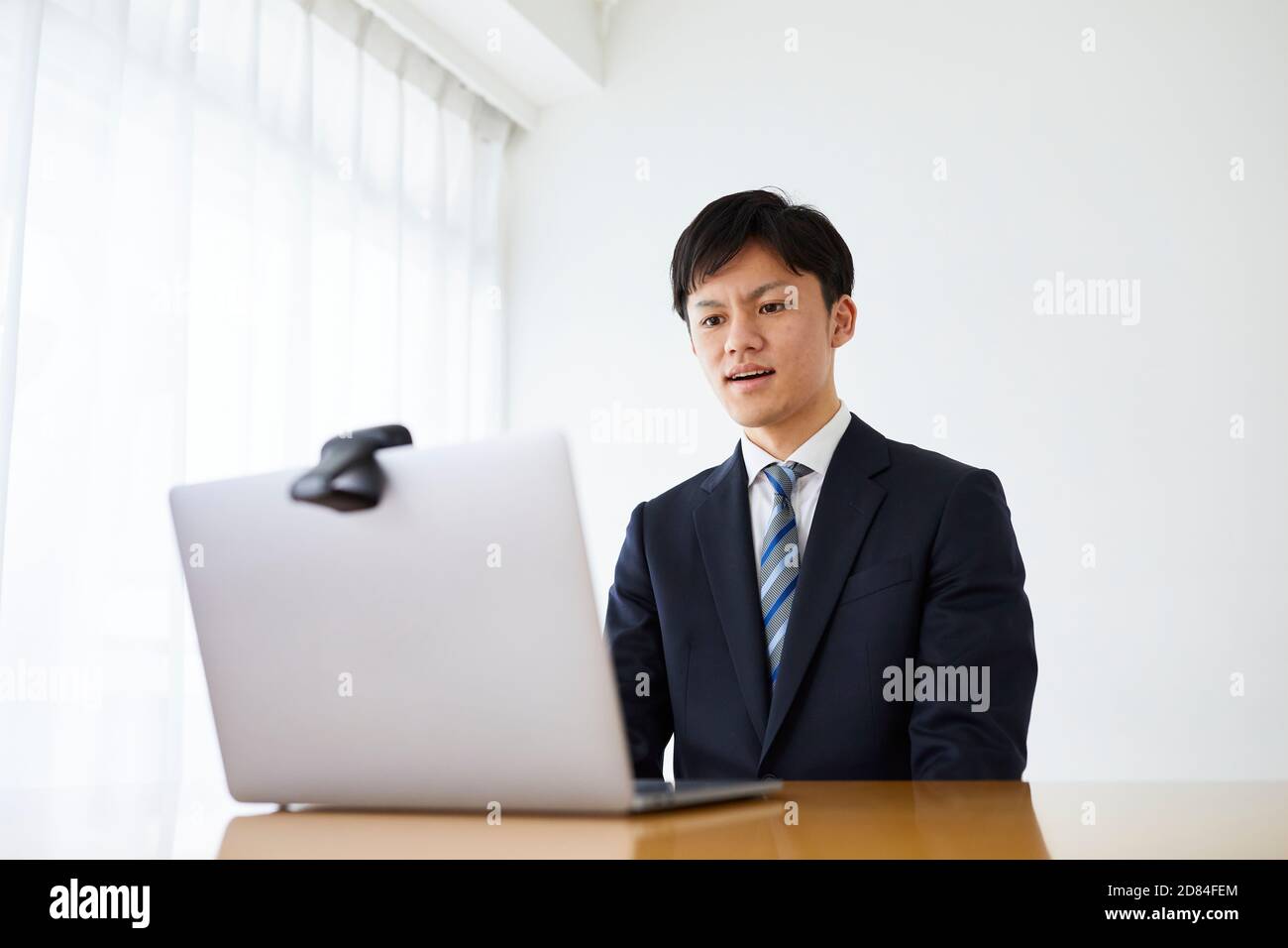 Japanese man working from home Stock Photo - Alamy