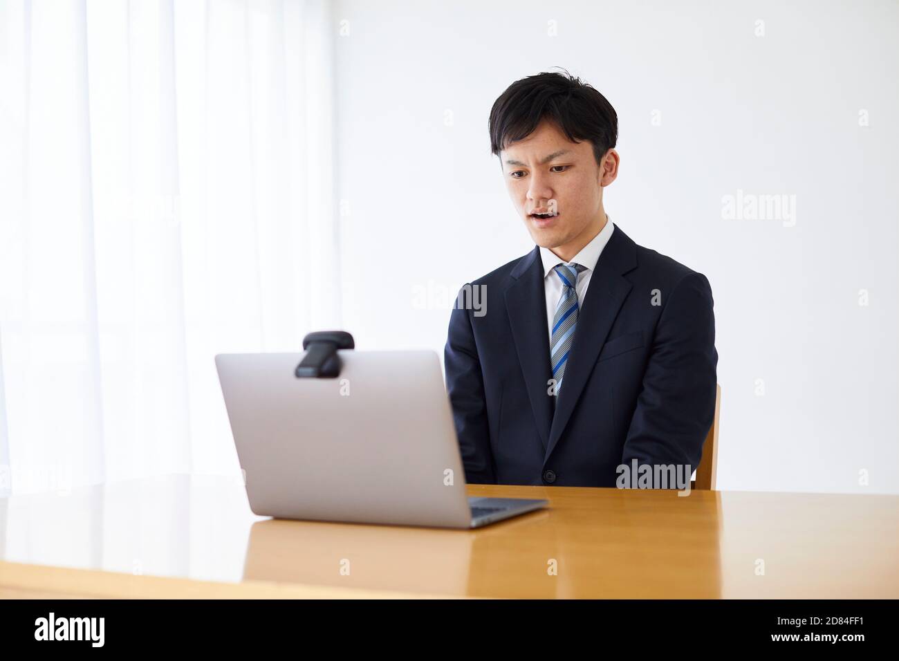 Japanese man working from home Stock Photo - Alamy