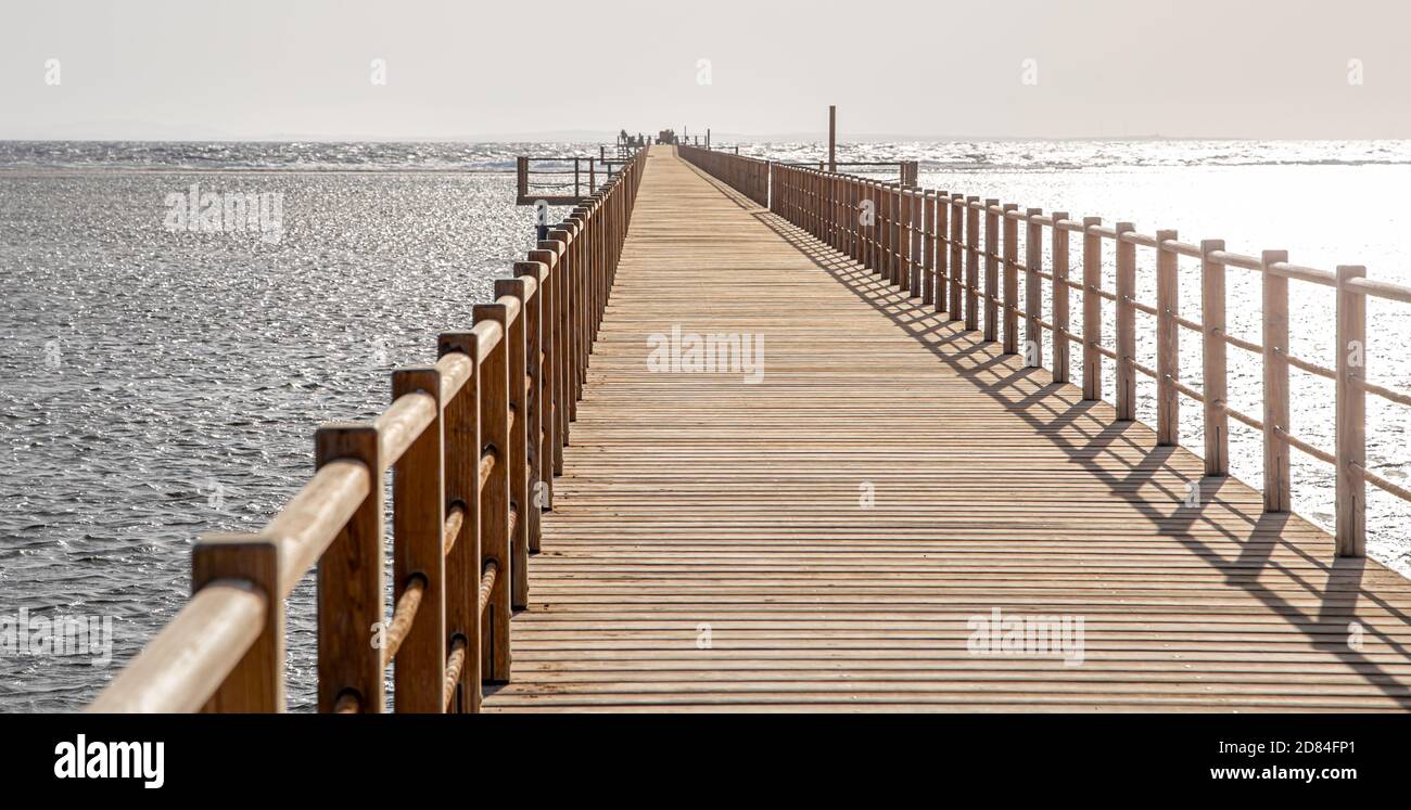 The background is a beautiful long wooden pier. close-up Stock Photo ...