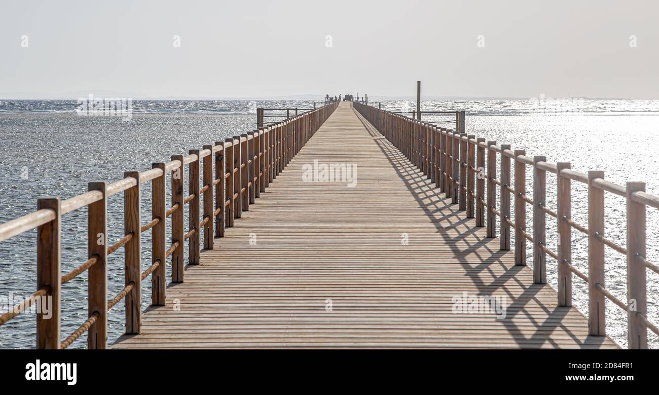 The background is a beautiful long wooden pier. close-up Stock Photo ...