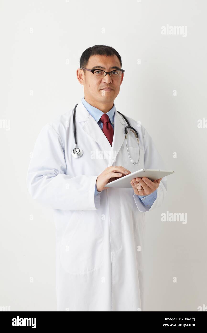 Japanese doctor in the studio Stock Photo - Alamy