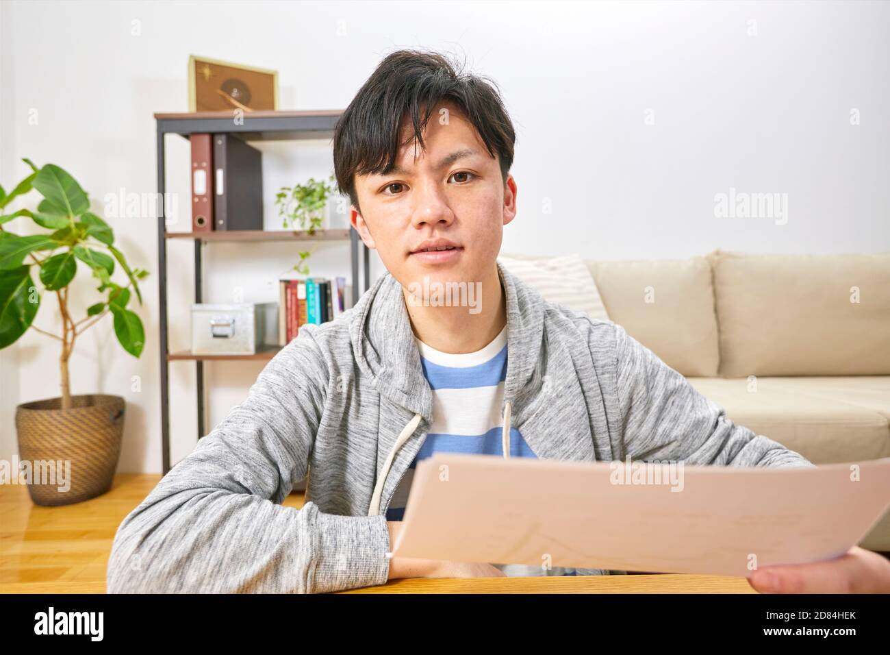 Japanese man working from home Stock Photo - Alamy