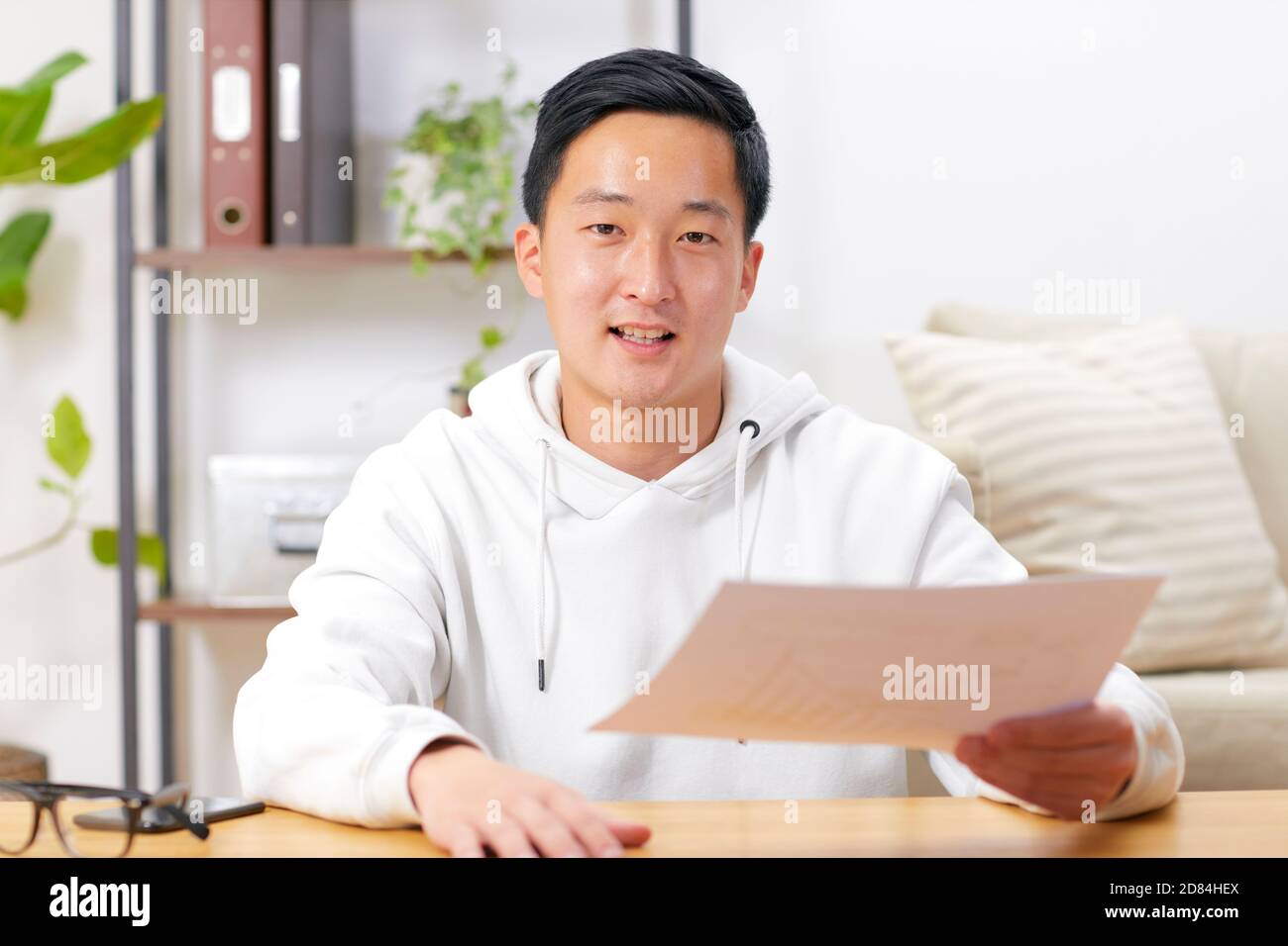 Japanese man working from home Stock Photo - Alamy