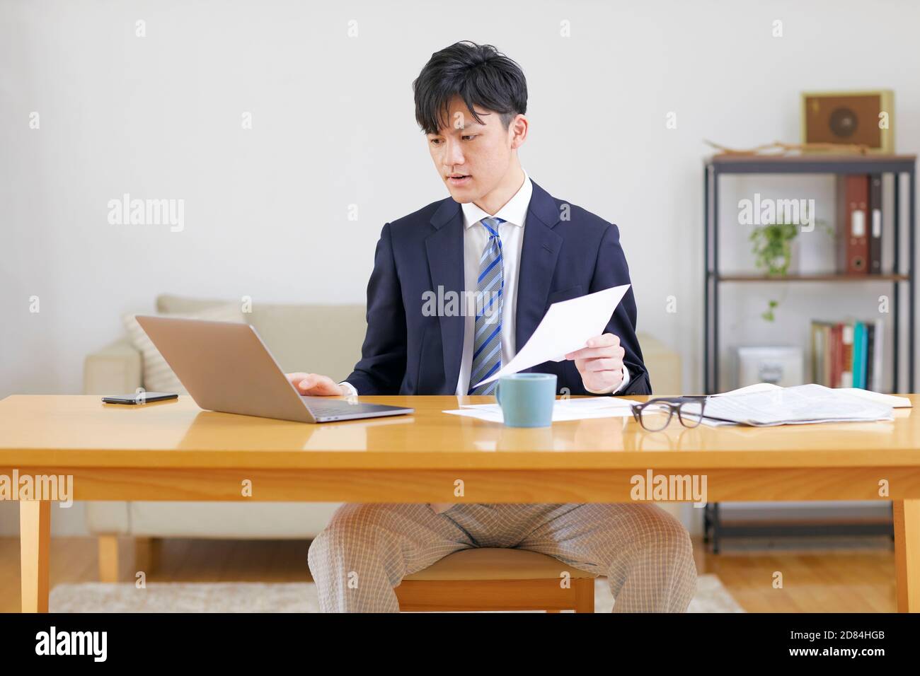 Japanese man working from home Stock Photo - Alamy