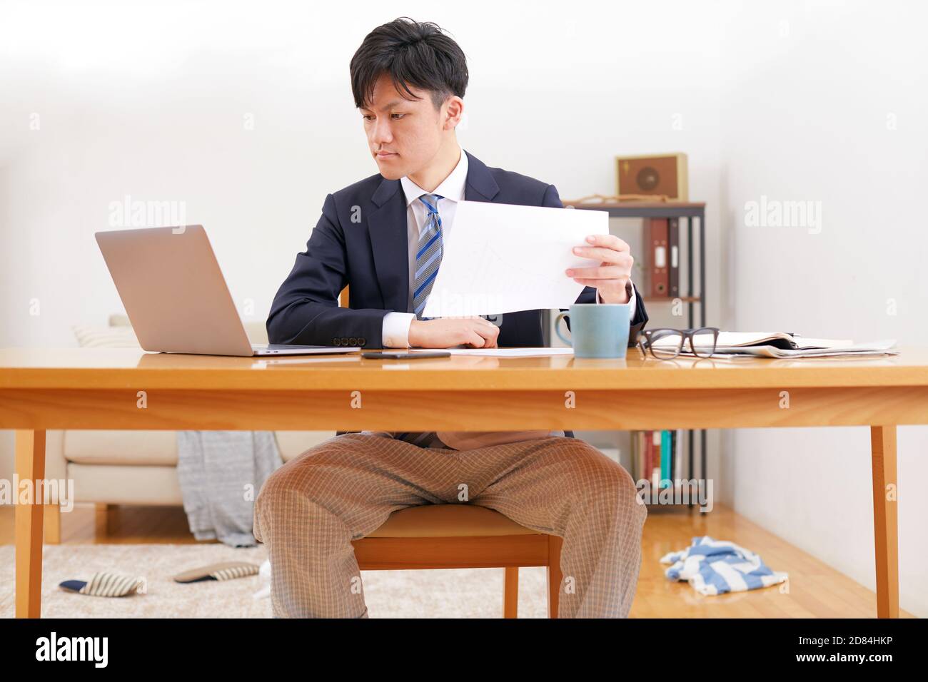 Japanese man working from home Stock Photo - Alamy